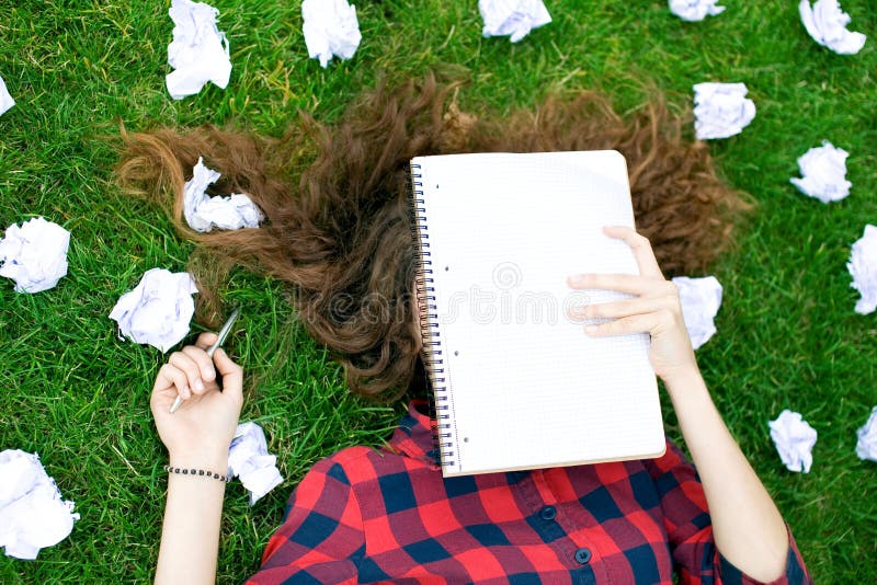 Student Surrounded by Crumpled Paper Stock Image - Image of teen, sheet ...
