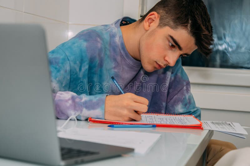Student at the Table Writing Stock Photo - Image of learn, enrollment ...