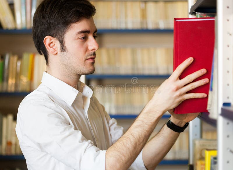 Guy Taking Book Shelf Library Stock Photos - Free & Royalty-Free Stock ...