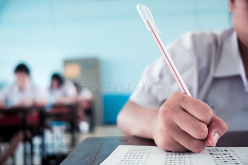 Student Taking Educational Exam Test in Class with Stress Stock Image ...