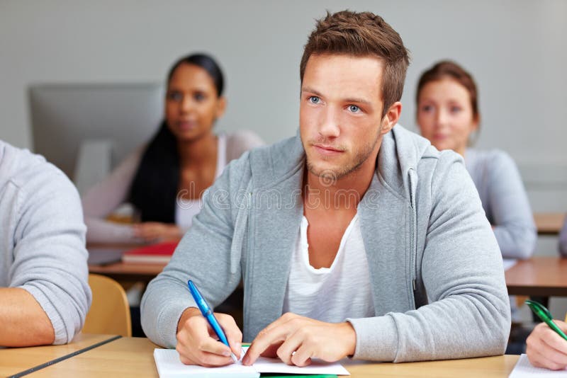 Student Taking Notes in Class Stock Photo - Image of student, school ...