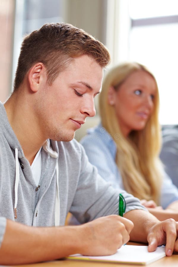 Student Taking Notes in Class Stock Image - Image of classroom ...
