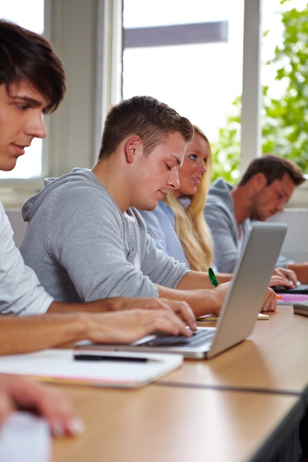 Student Taking Notes at Laptop Stock Photo - Image of education ...