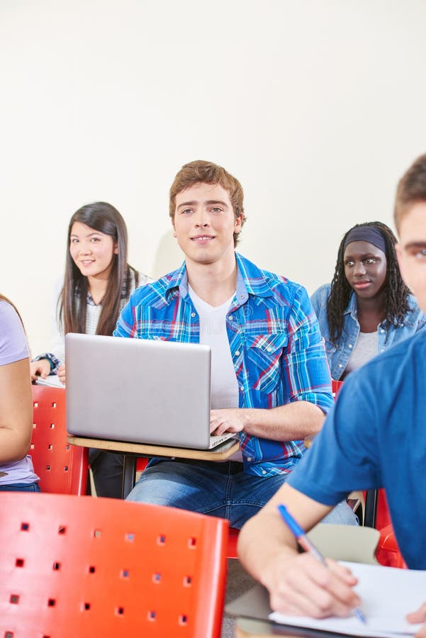 Student Taking Notes in Class Stock Photo - Image of student, school ...