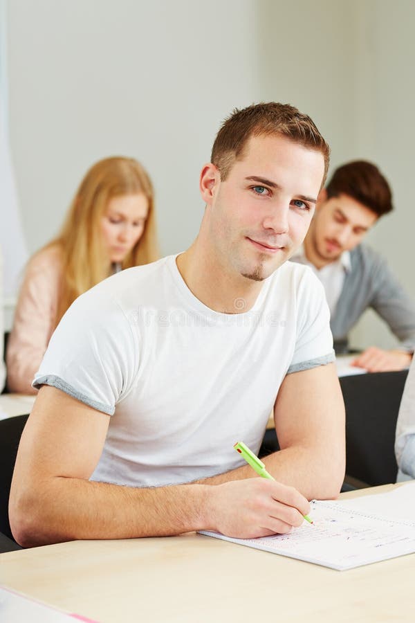 Student Taking Notes in Class Stock Photo - Image of student, school ...