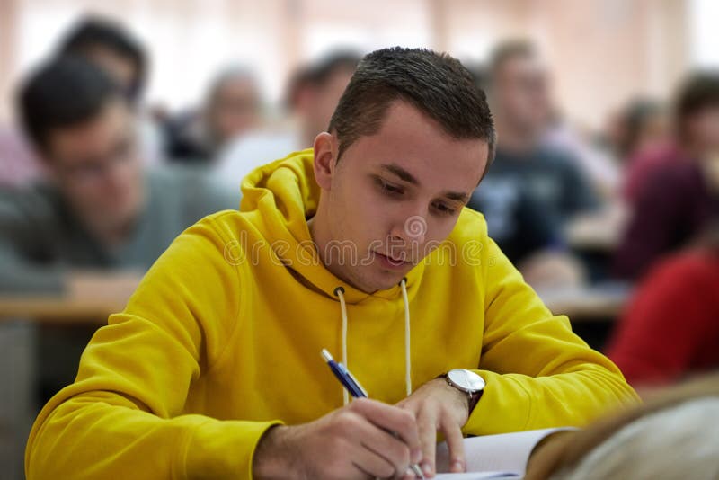 Student Taking Notes while Studying in High School Stock Image - Image ...