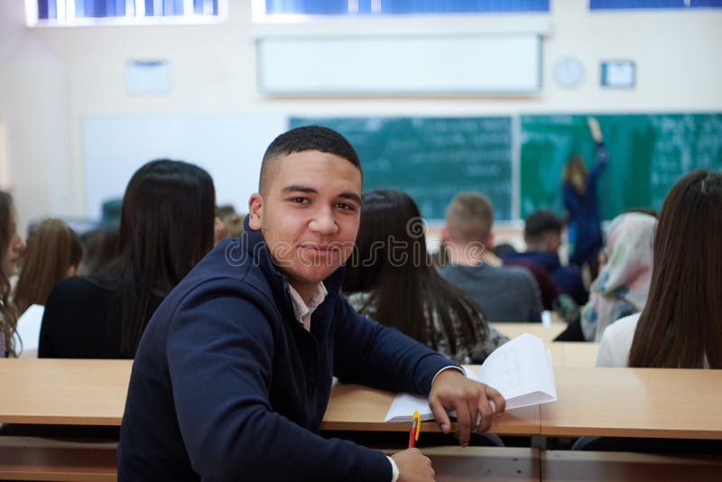 Student Taking Notes while Studying in High School Stock Image - Image ...