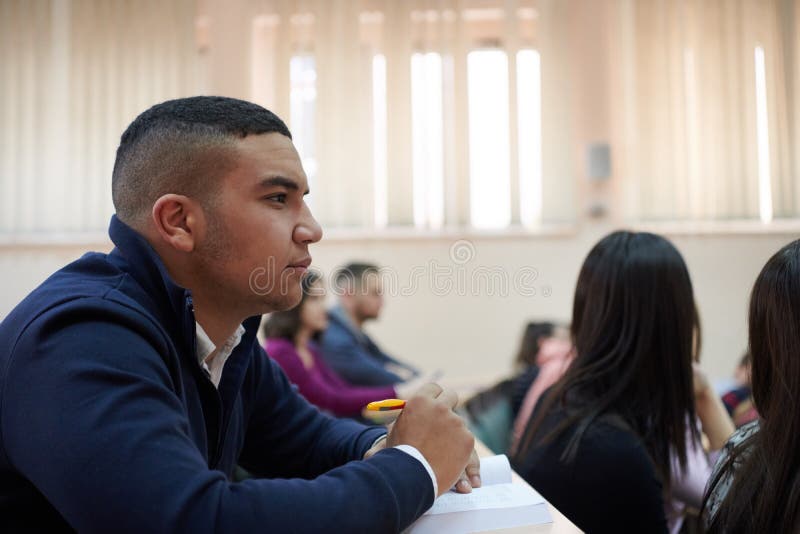 Student Taking Notes while Studying in High School Stock Image - Image ...