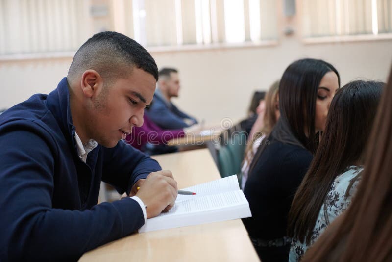 Student Taking Notes while Studying in High School Stock Image - Image ...