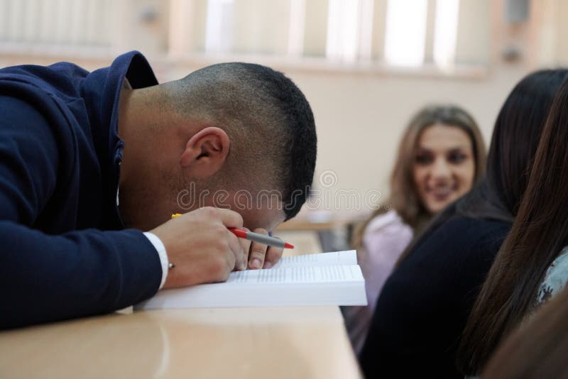 Student Taking Notes while Studying in High School Stock Image - Image ...