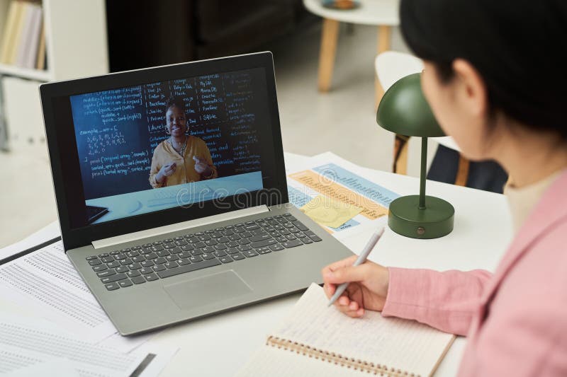 Student Watching Online Language Class on Laptop Screen Stock Photo ...