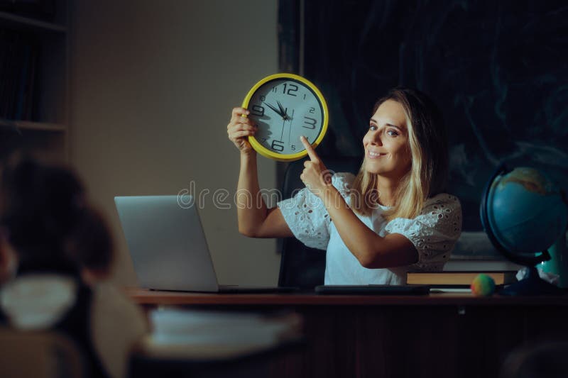 Teacher Pointing at the Clock during Examination Tests in Class Stock ...