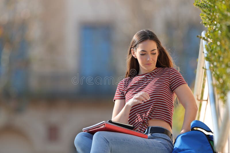 Student Taking Things Out of the Backpack Stock Image - Image of female ...