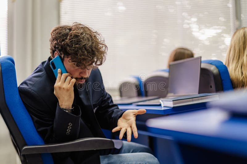 Student Talking and Arguing on His Phone during Class Stock Image ...