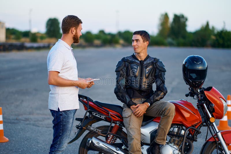Student Talking with Instructor, Motorcycle School Stock Image - Image ...