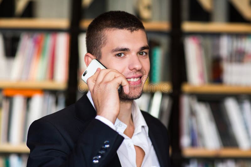 Student Talking on the Phone in the Library Stock Photo - Image of ...
