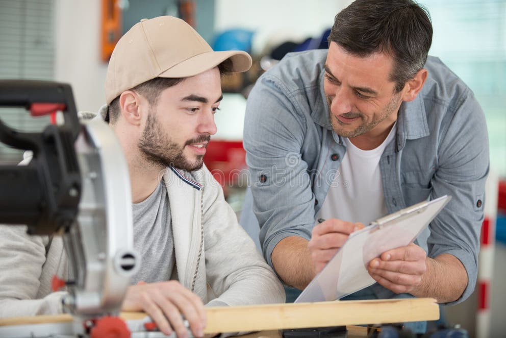 Student and Teacher in Carpentry Class Stock Photo - Image of ...