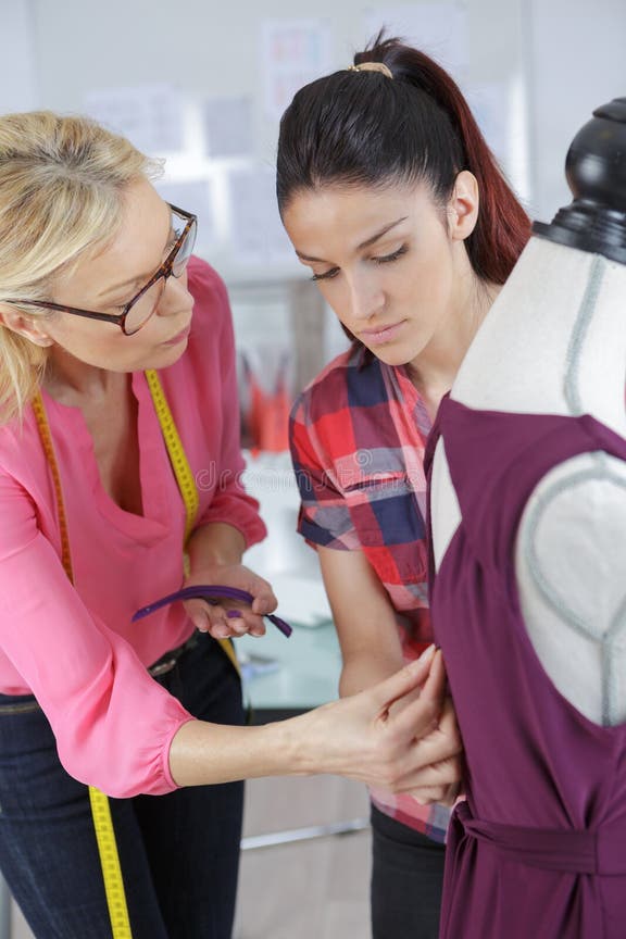 Student with Teacher in Dressmaking Class Stock Image - Image of ...