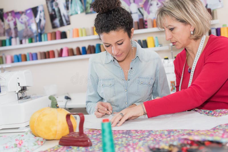 Student with Teacher in Dressmaking Class Stock Image - Image of ...