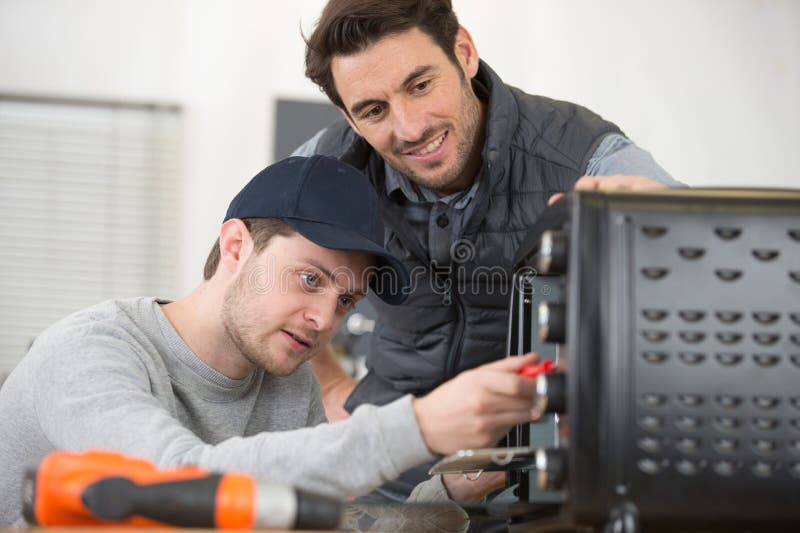 Student and Teacher Repair Computer Stock Image - Image of ...