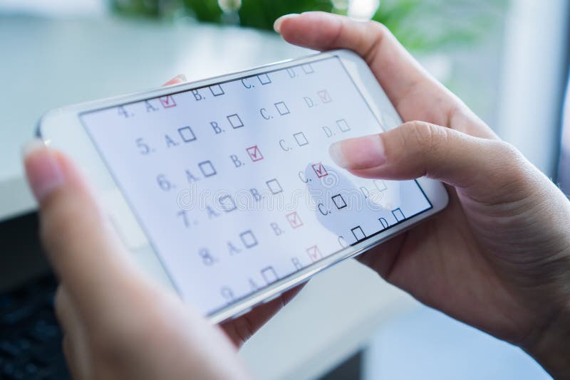 Student Testing E-learning Exam on Tablet Computer with Multiple Choice ...
