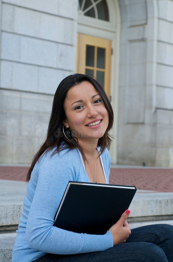 Student with Textbook on Campus Stock Photo - Image of beautiful, smile ...
