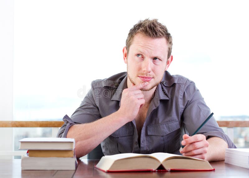 Young man thinking hard stock photo. Image of blue, eyes - 22292668