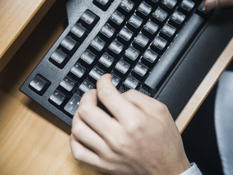 Student Typing His Work Using the Keyboard, Which Was Placed on the ...