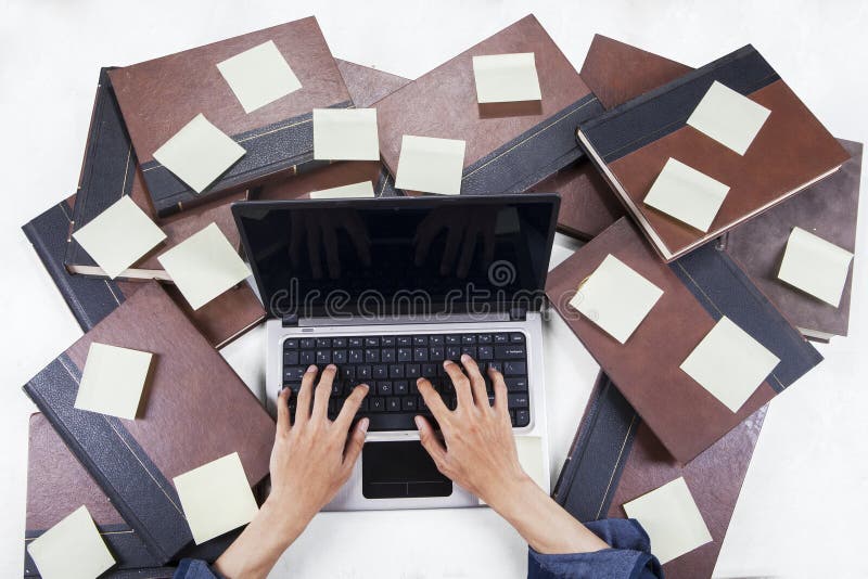 Student Typing with Laptop Around Books Stock Photo - Image of book ...