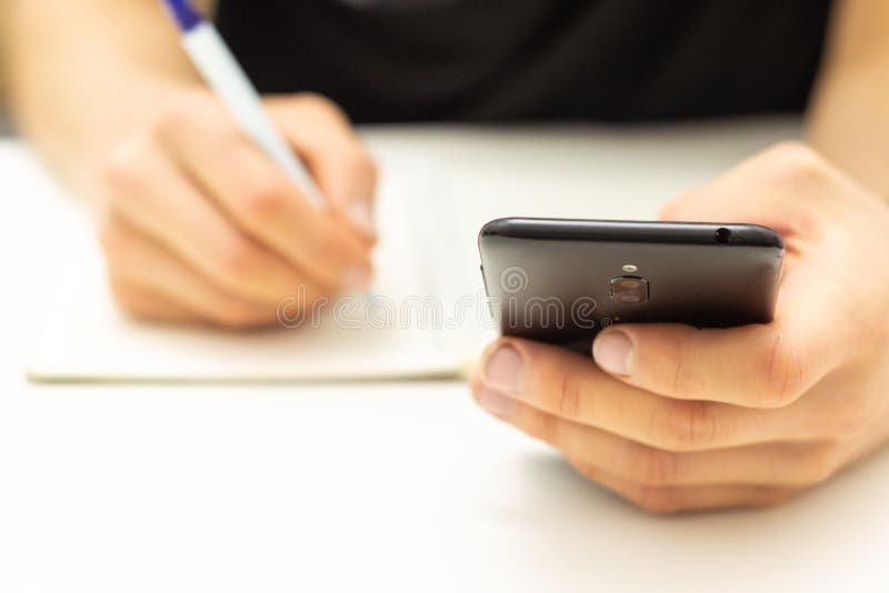 Student Use Cell Phone Searching Information from Network.writing on ...