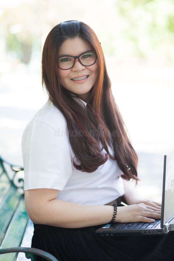 Student use Notebook. stock photo. Image of laptop, smile - 53599058