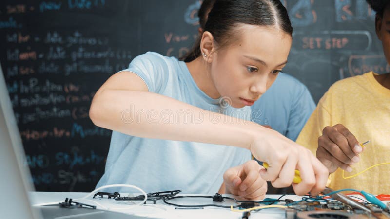 Student Use Tool Fixing Board while Teacher Prepare Car Robot ...