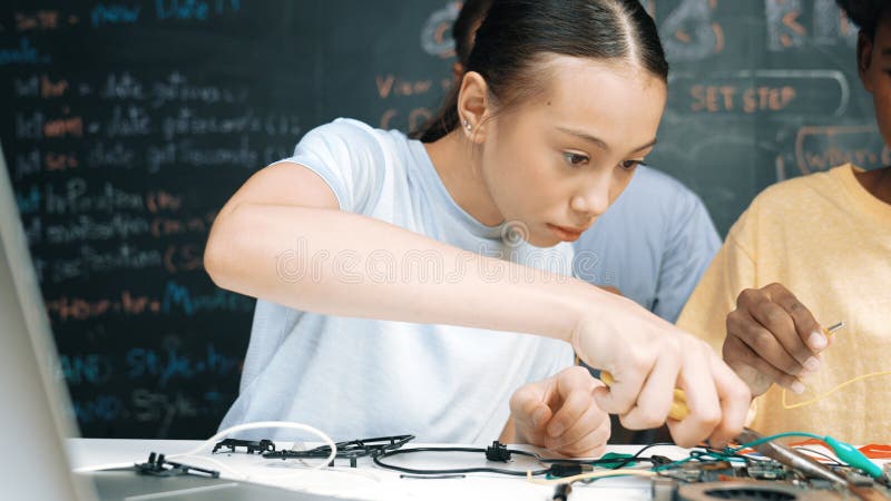 Student Use Tool Fixing Board while Teacher Prepare Car Robot ...