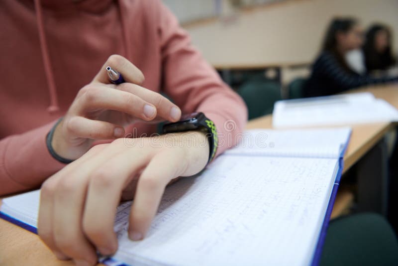The Student Uses a Smartwatch in Math Class Stock Photo - Image of girl ...