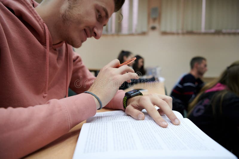 The Student Uses a Smartwatch in Math Class Stock Photo - Image of ...