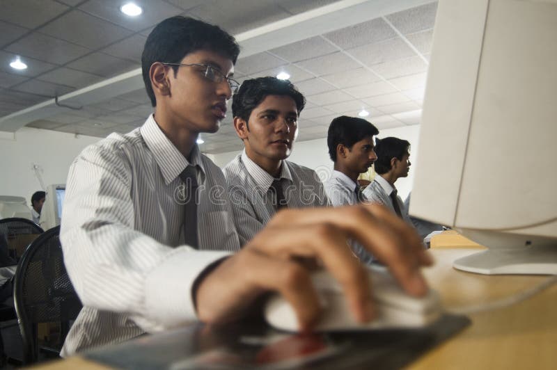 Student using computer editorial image. Image of young - 26339860