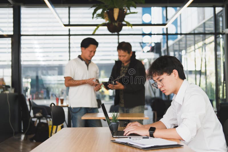 Student Using Computer for Learning Leasson Online at Cafe. Star Stock ...