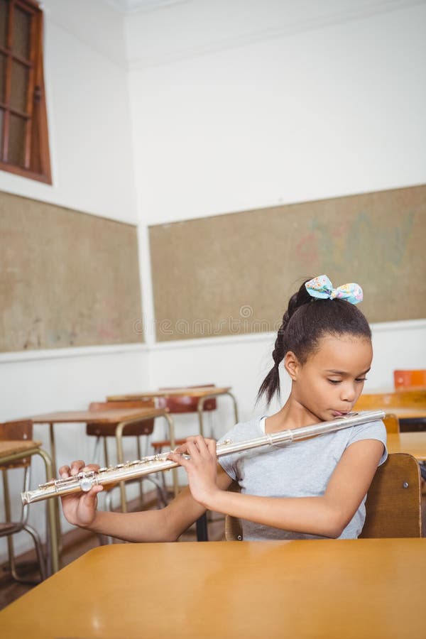 Student Using a Flute in Class Stock Image - Image of early ...