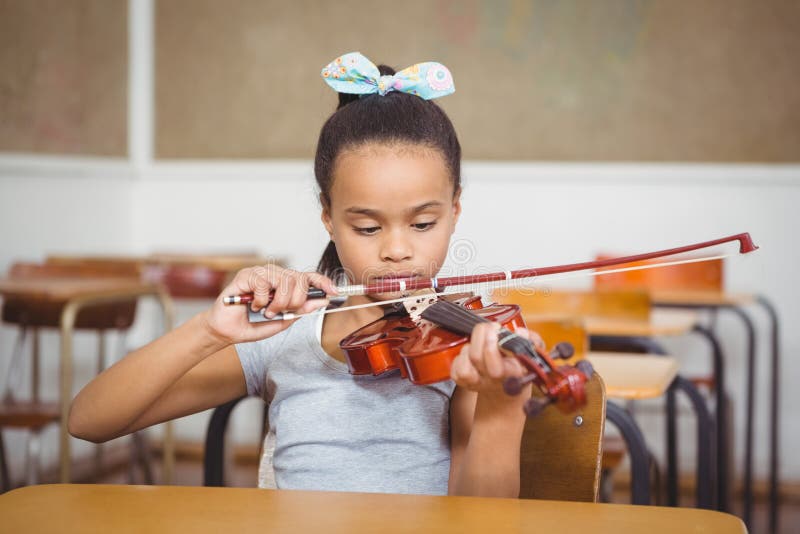 Student Using a Flute in Class Stock Image - Image of attentively ...