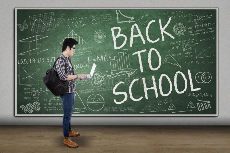 Student Using Laptop Computer in Class Stock Photo - Image of backpack ...
