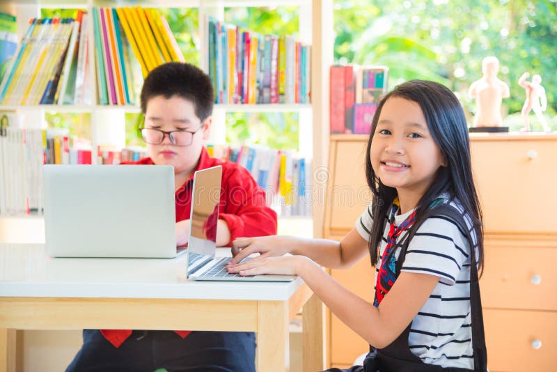 Student Using Laptop Computer in Library Stock Image - Image of people ...