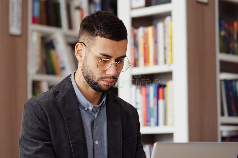 Student Using Laptop in Library for Scientific Research Stock Image ...
