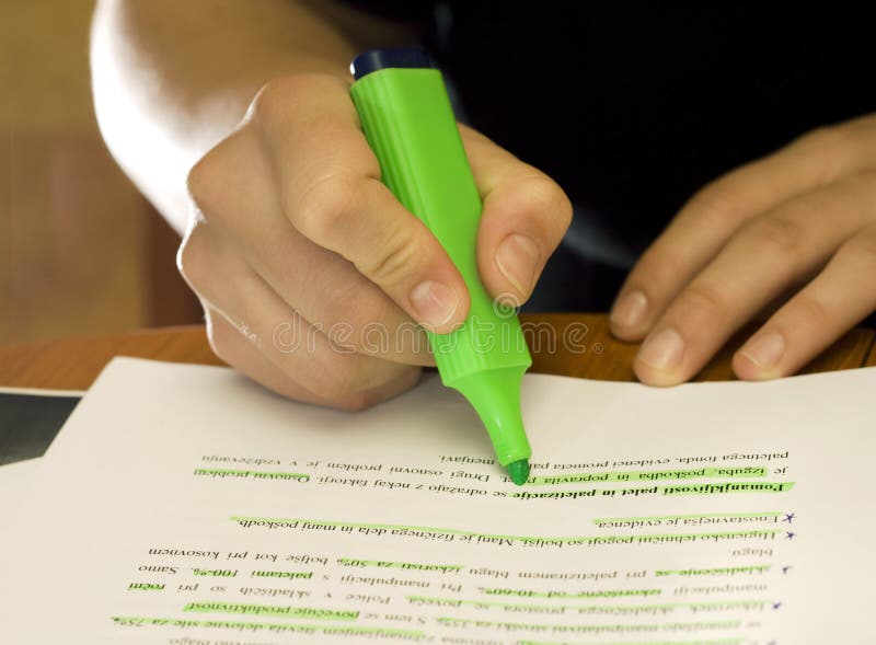 Student Using Marker To Mark Important Text Stock Photo - Image of ...
