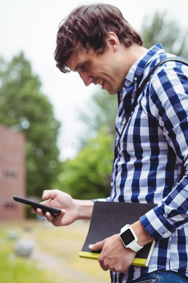 Student Using Mobile Phone in Campus Stock Image - Image of attractive ...