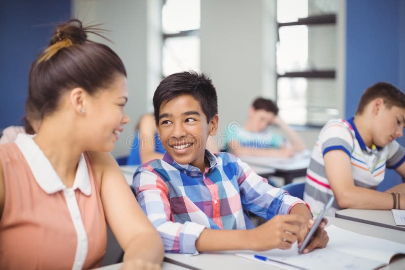 Student Using Mobile Phone in Classroom Stock Photo - Image of male ...