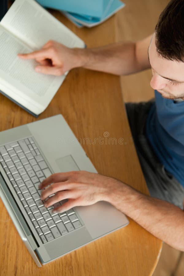 Student Using Notebook for His Homework Stock Image - Image of modern ...