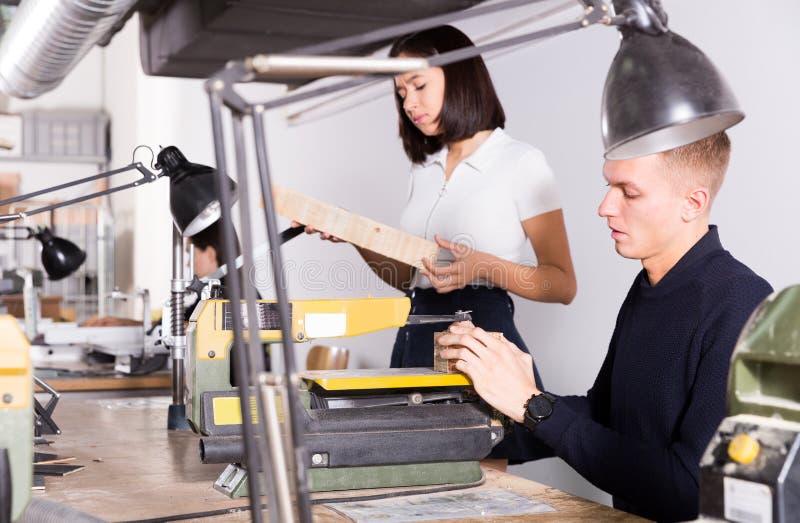 Student Using Scroll Saw in Architectural Modeling Stock Photo - Image ... Student Using Scroll Saw in Architectural Modeling Stock Photo - Image ...