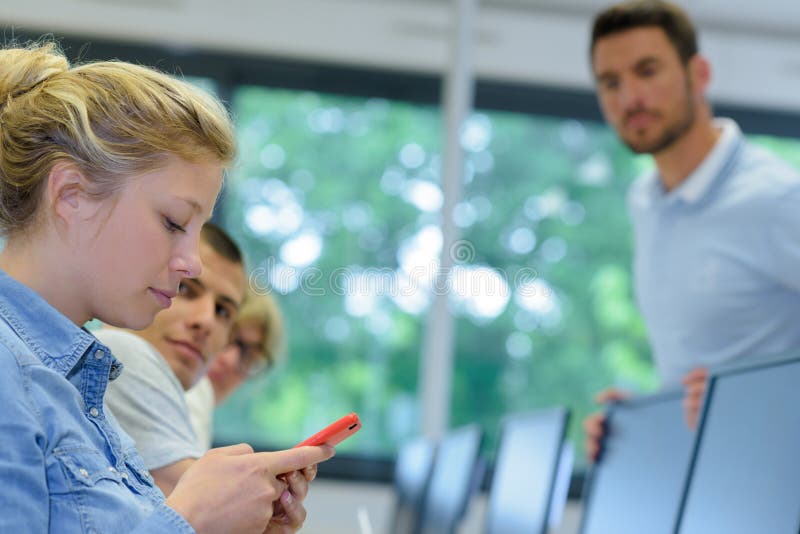 Student Using Smartphone in Classroom Stock Image - Image of assistance ...