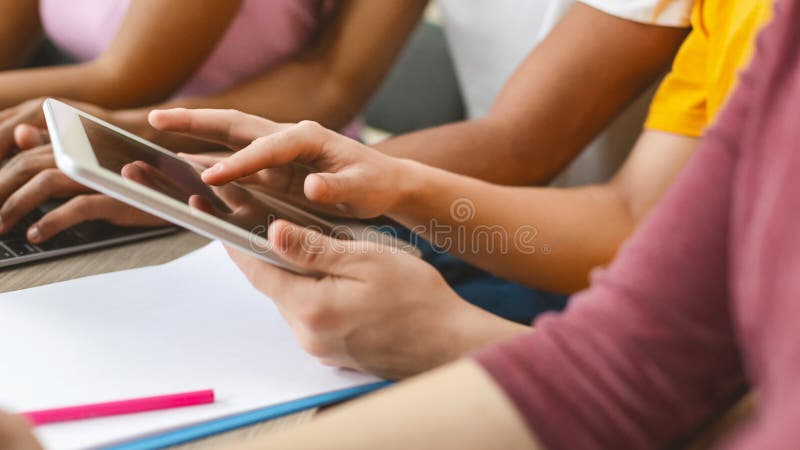 Student Using Tablet for Studying, Turning Page Stock Photo - Image of ...