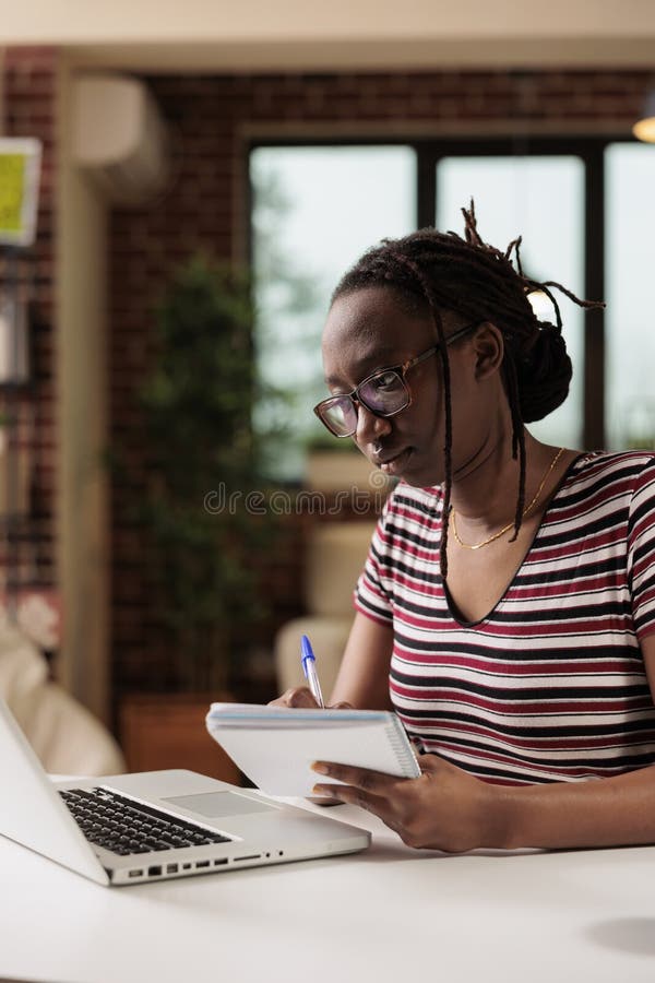 Student Watching Webinar, Reading Educational Materials, Taking Notes ...